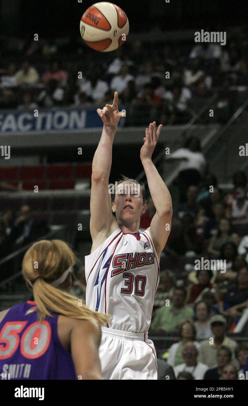 Detroit Shock's Katie Smith (30) takes a shot over Phoenix Mercury's ...