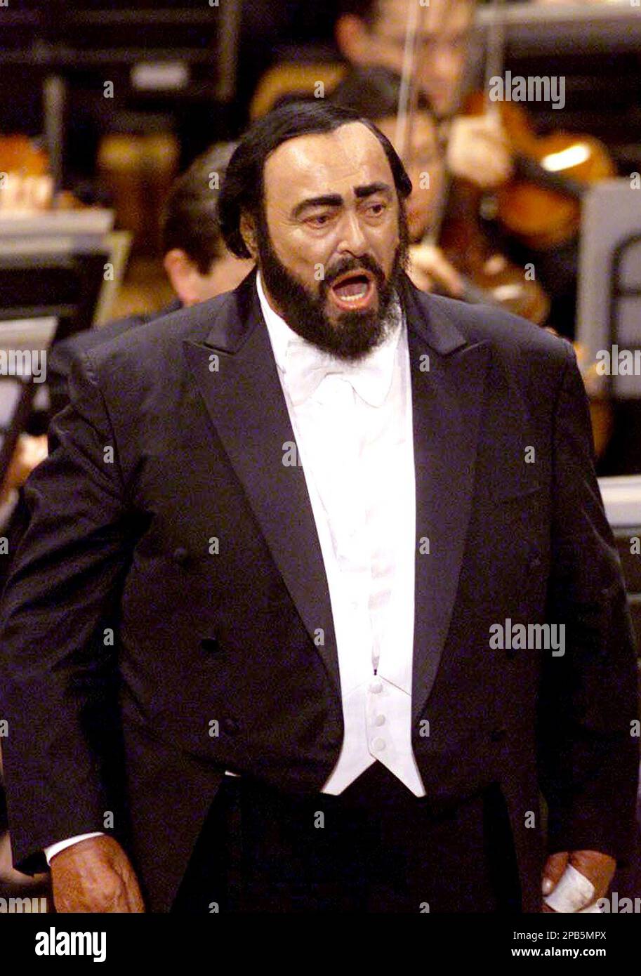 **FILE**Tenor Luciano Pavarotti sings during a concert marking the 40th ...