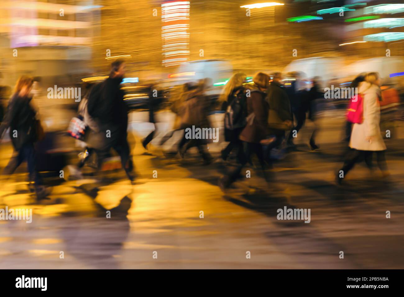 abstract blurred picture of crowds of commuters walking on a city ...