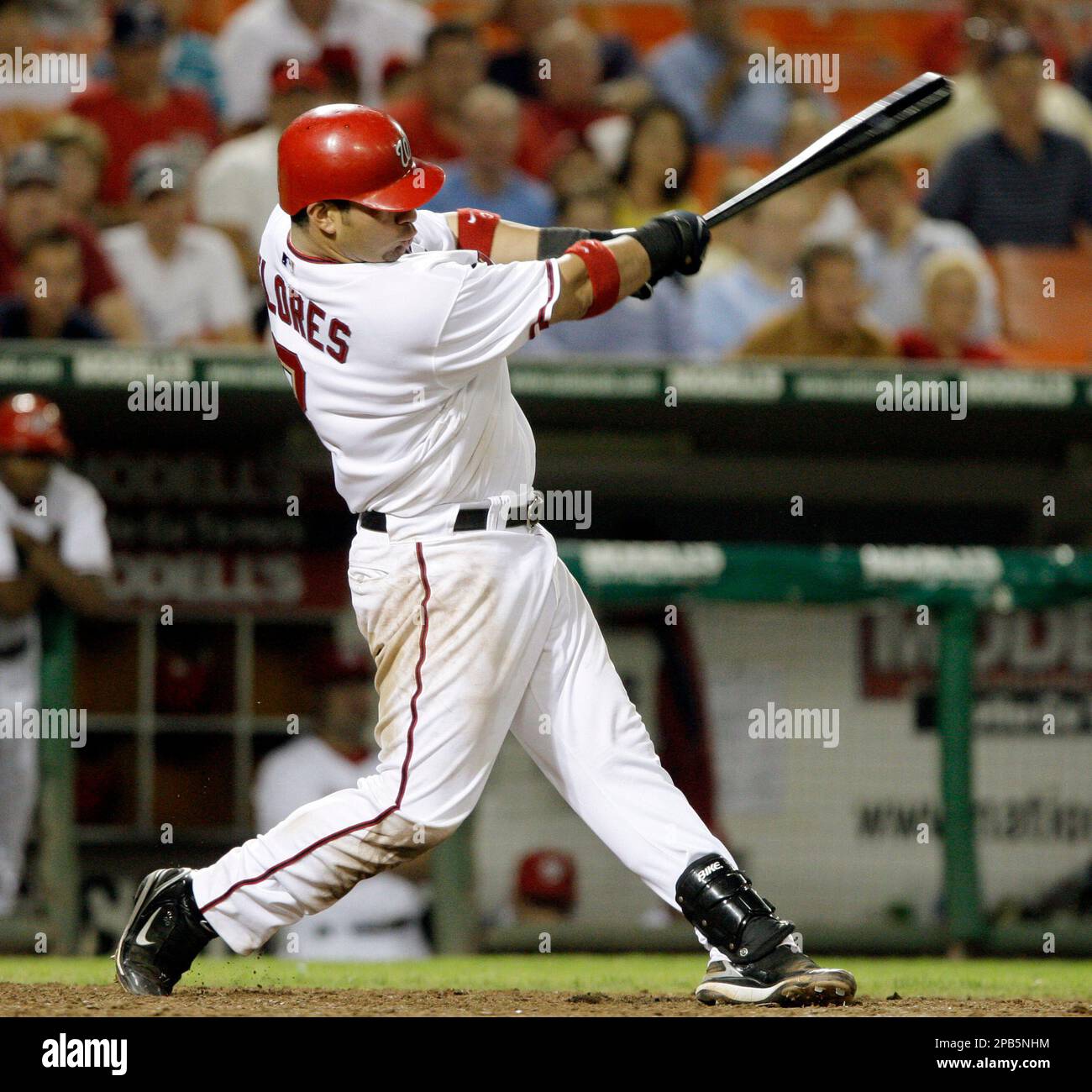 Washington Nationals' Jesus Flores hits a double off Florida Marlins ...