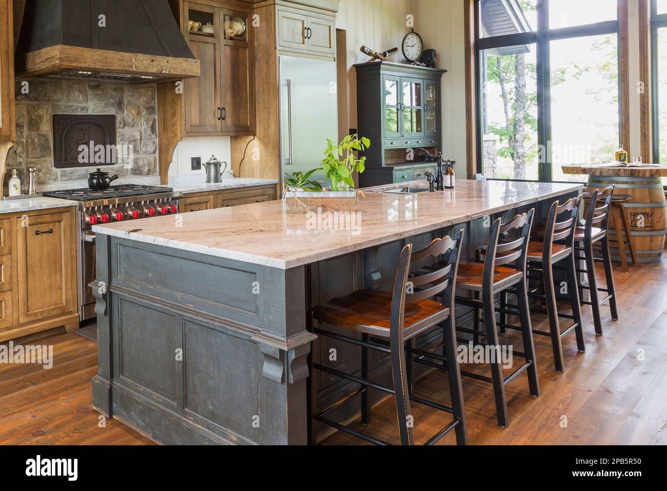 Antique charcoal pine wood island with nuanced light grey granite ...