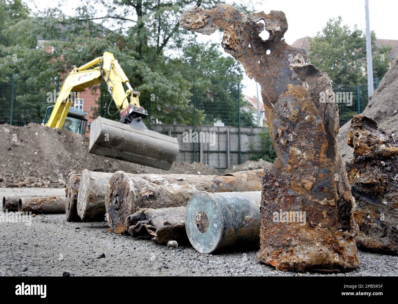 ** FILE ** Recovered rusted shells are seen at a sports field in Berlin ...