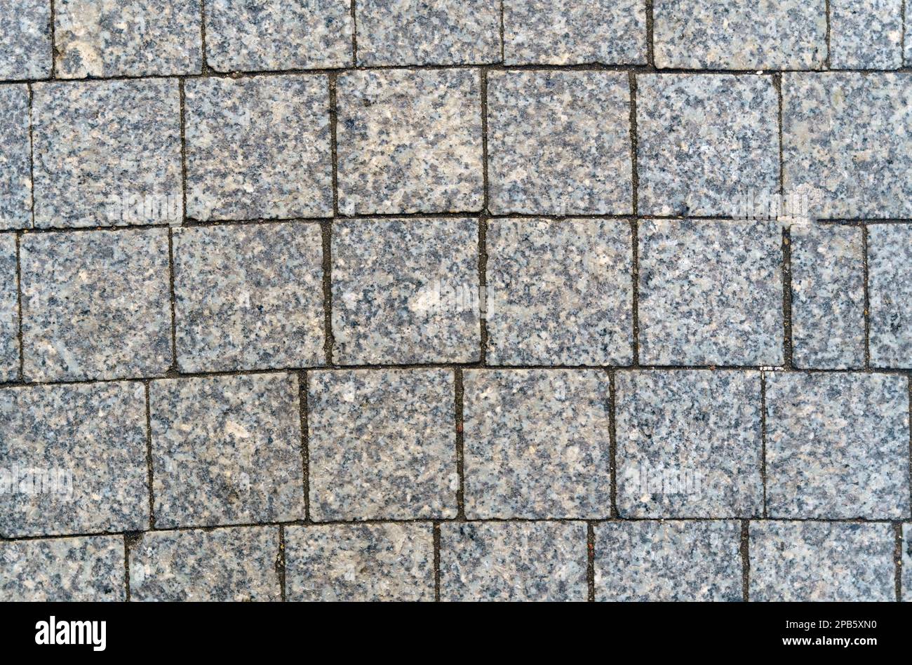 Pavement texture. Abstract background of gray paving slabs from small ...