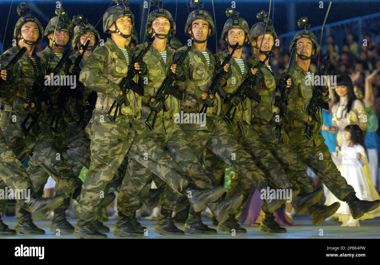 Uzbek troops march during a parade marking the Central Asian nation's ...