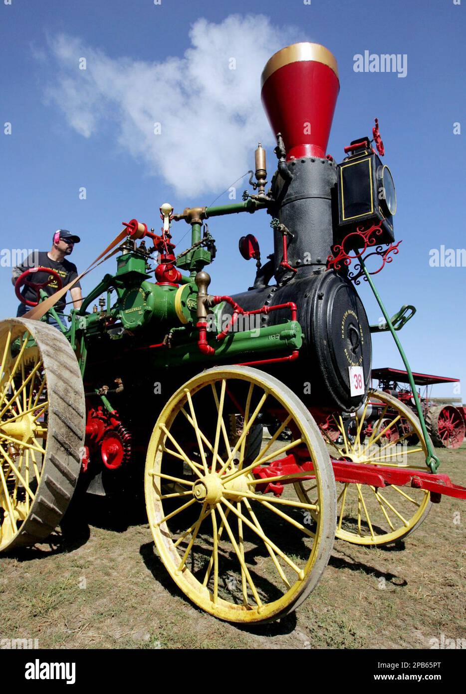 Steve Kunz, Valley Park, Mo., operates his 1882 Harrison Traction ...