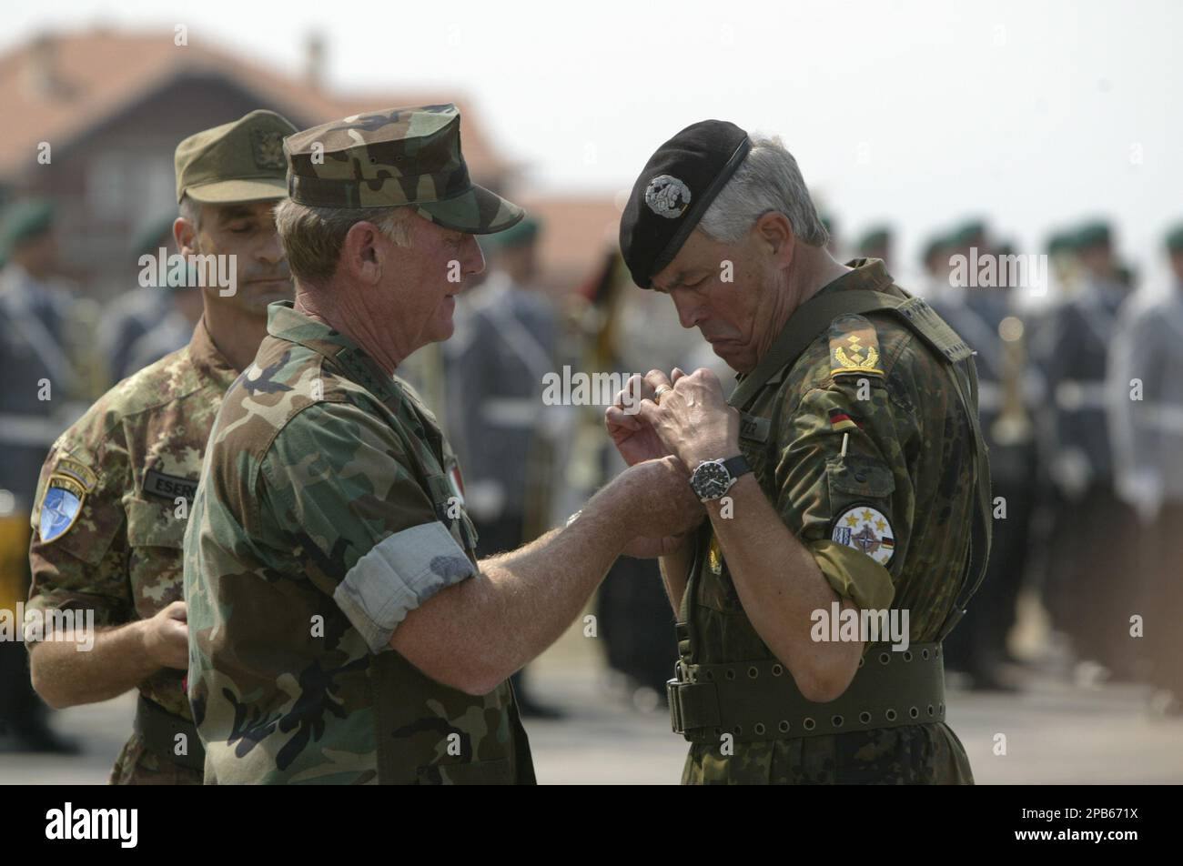 NATO's commander for southeastern Europe Adm. Harry Ulrich, left ...