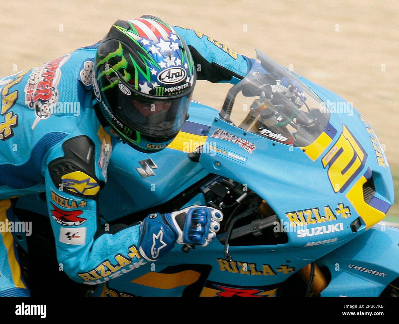 John Hopkins, of the United States, steers his Suzuki during free ...