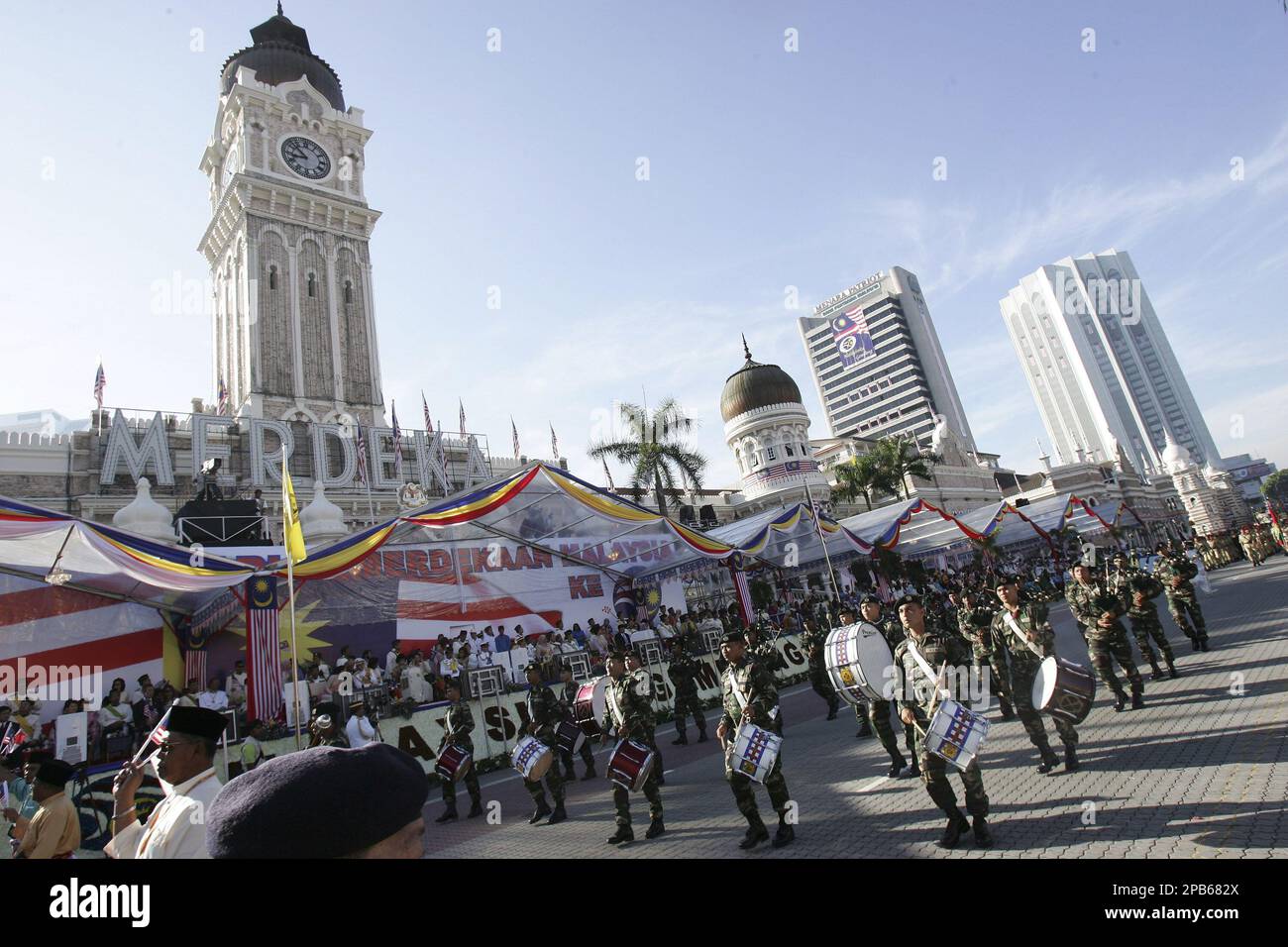Brass band members from Malaysian Army perform during a parade through ...