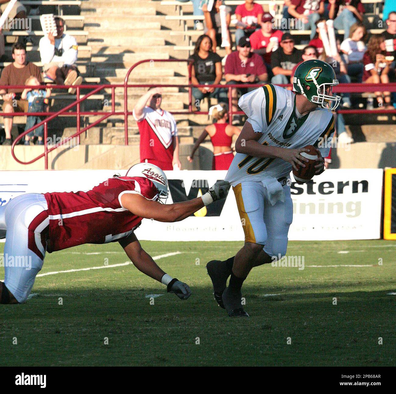 Southeastern Louisiana quarterback Brian Babin tries to elude New ...