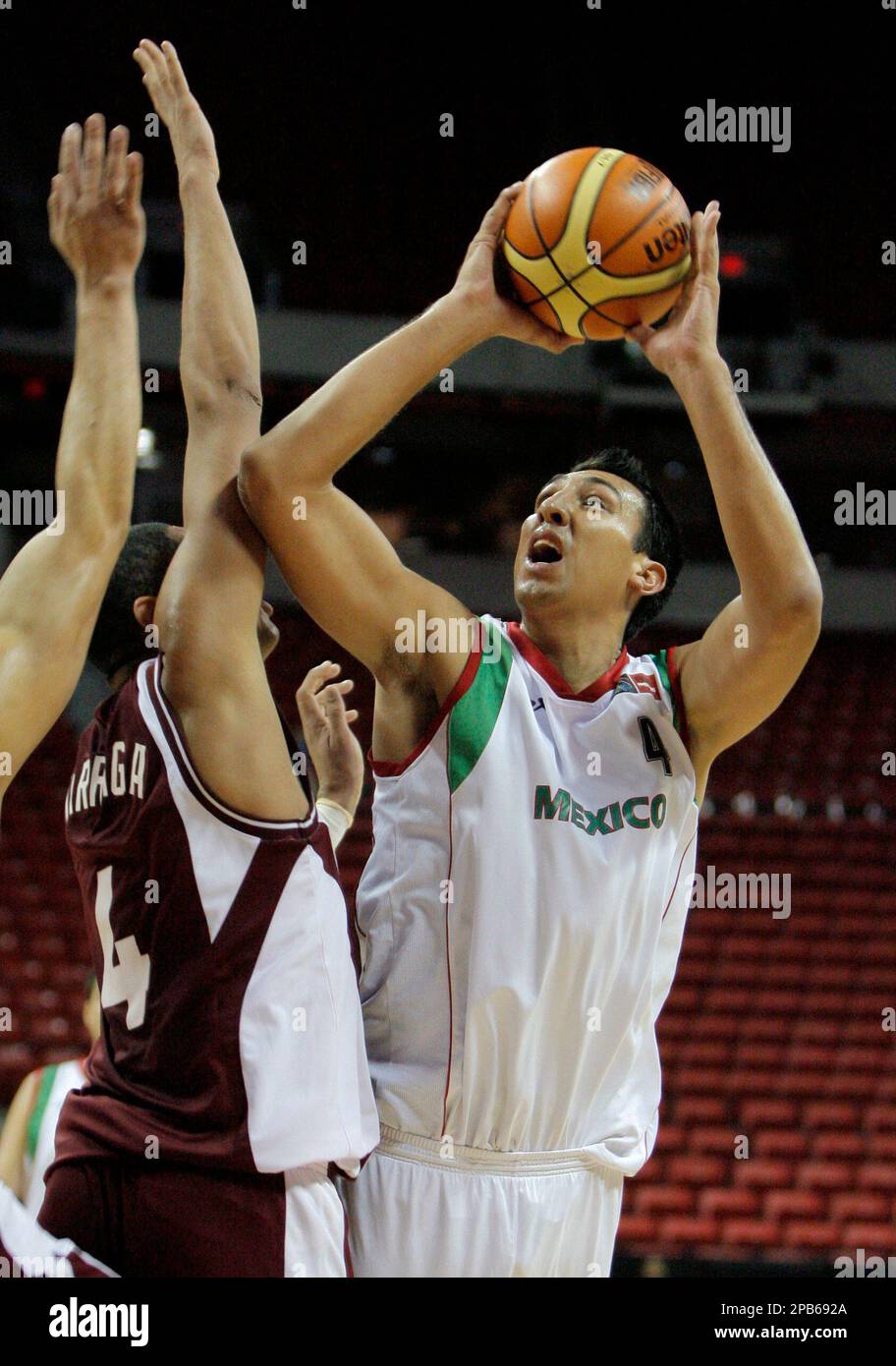 Mexico's Adam Parada, right, looks to shoot as he is defended by ...