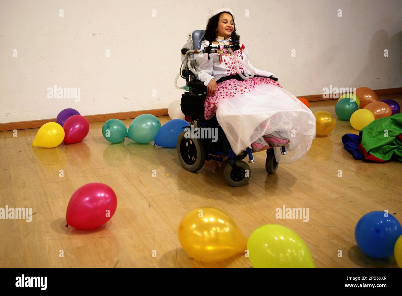 Palestinian Mariya Aman, 6, who was paralyzed from her neck down after ...