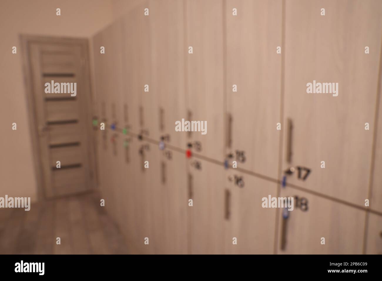Blurred view of changing room with lockers Stock Photo - Alamy