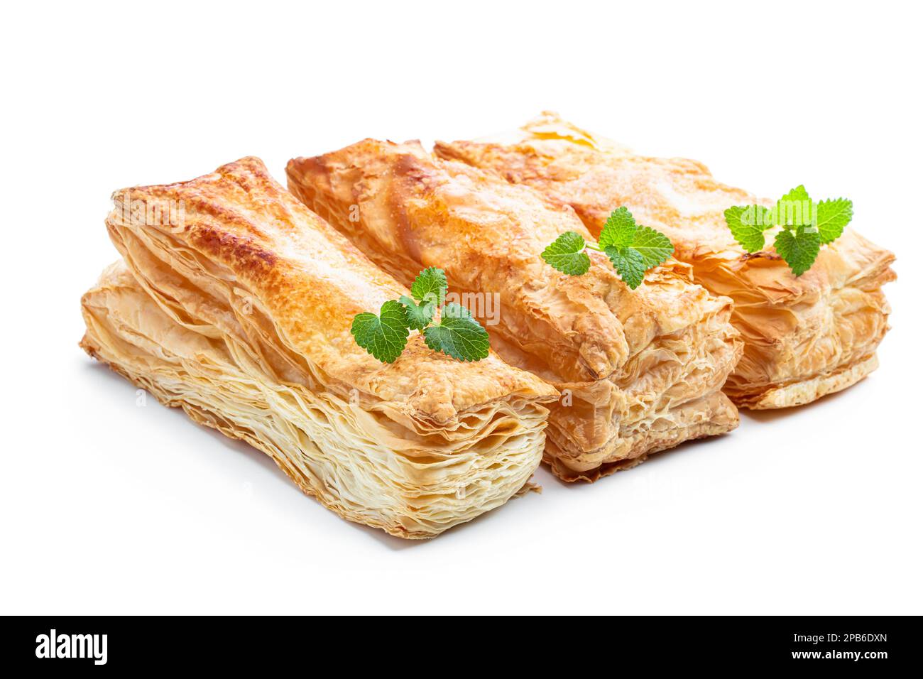 Puff pastry cake slices isolated on white Stock Photo - Alamy