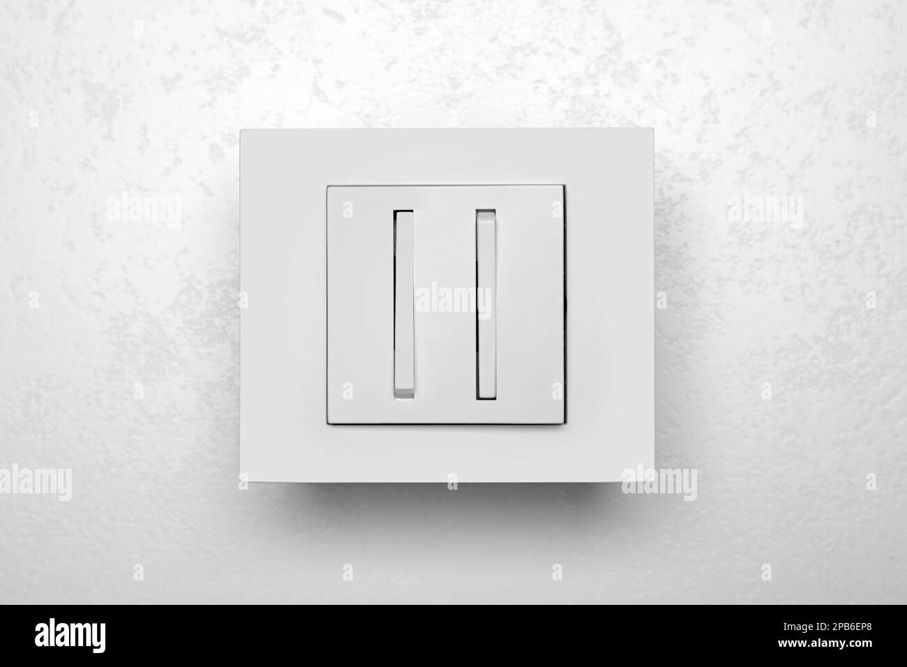 Light switch on white background, top view Stock Photo - Alamy