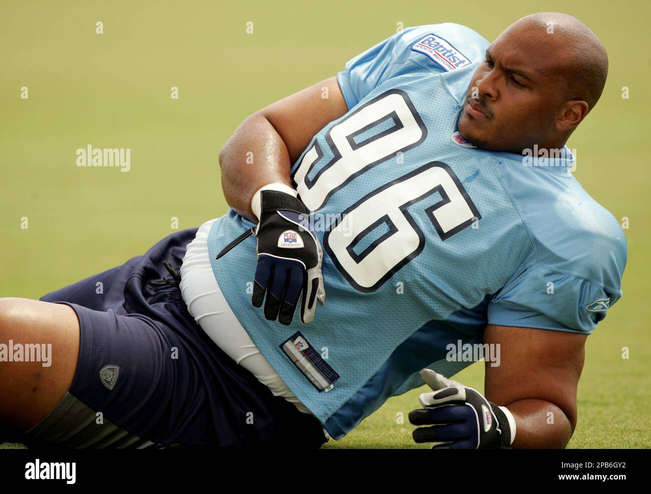 Tennessee Titans defensive lineman Corey Simon (96) stretches before ...