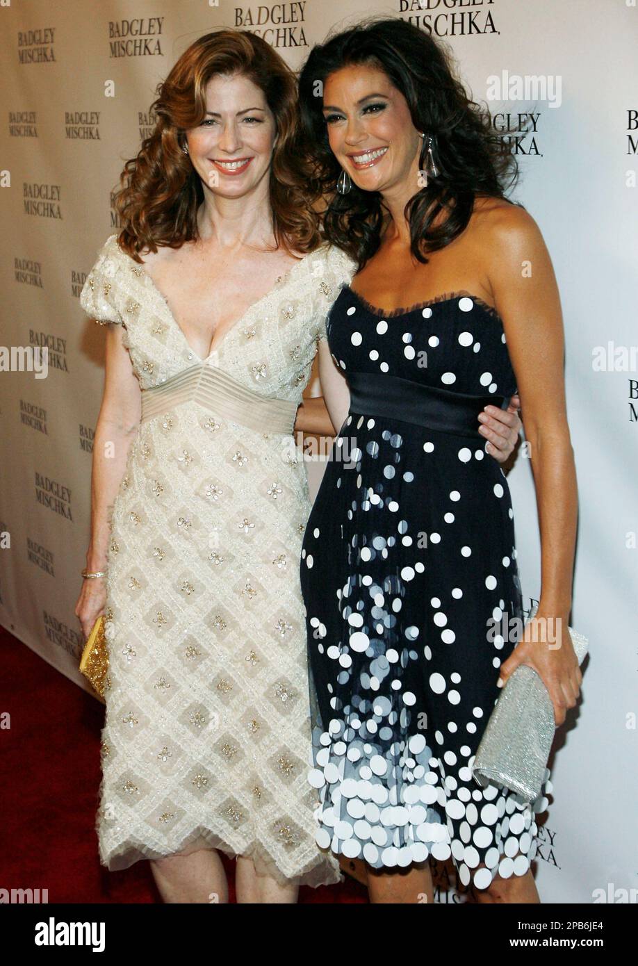 Teri Hatcher, right, and Dana Delany pose together at a party ...