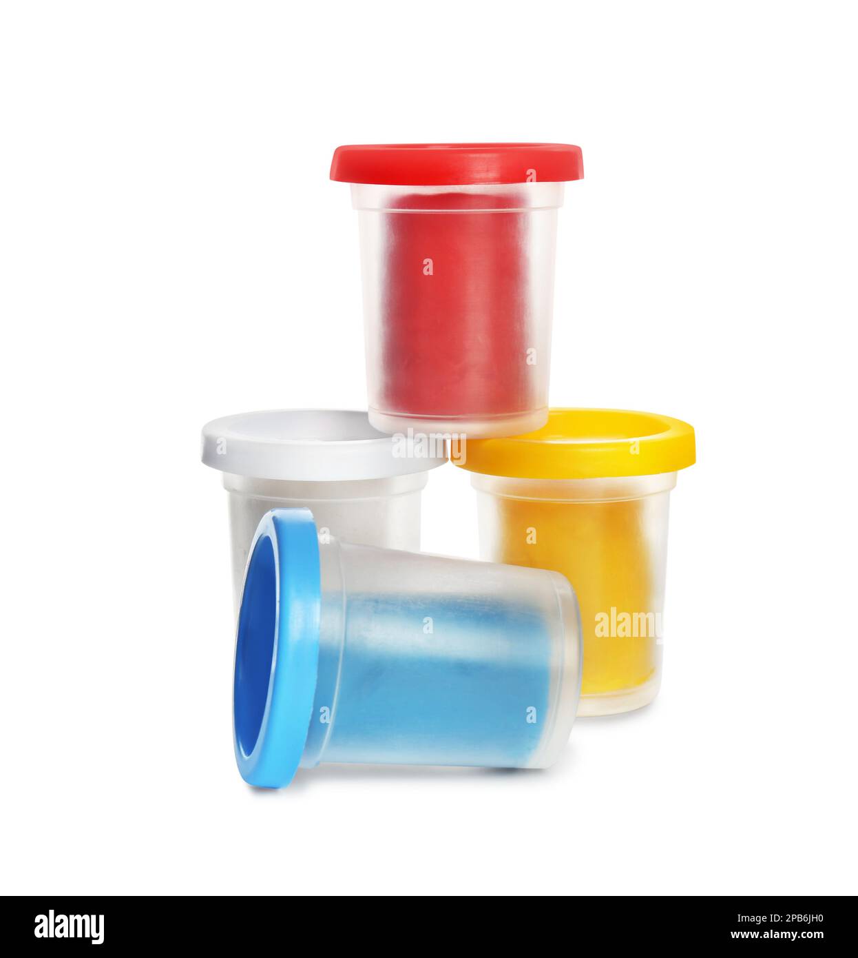 Plastic containers with colorful play dough on white background Stock ...