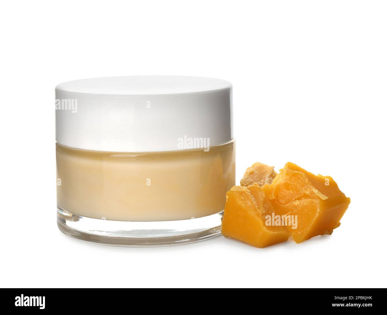 Cream and natural beeswax on white background Stock Photo - Alamy