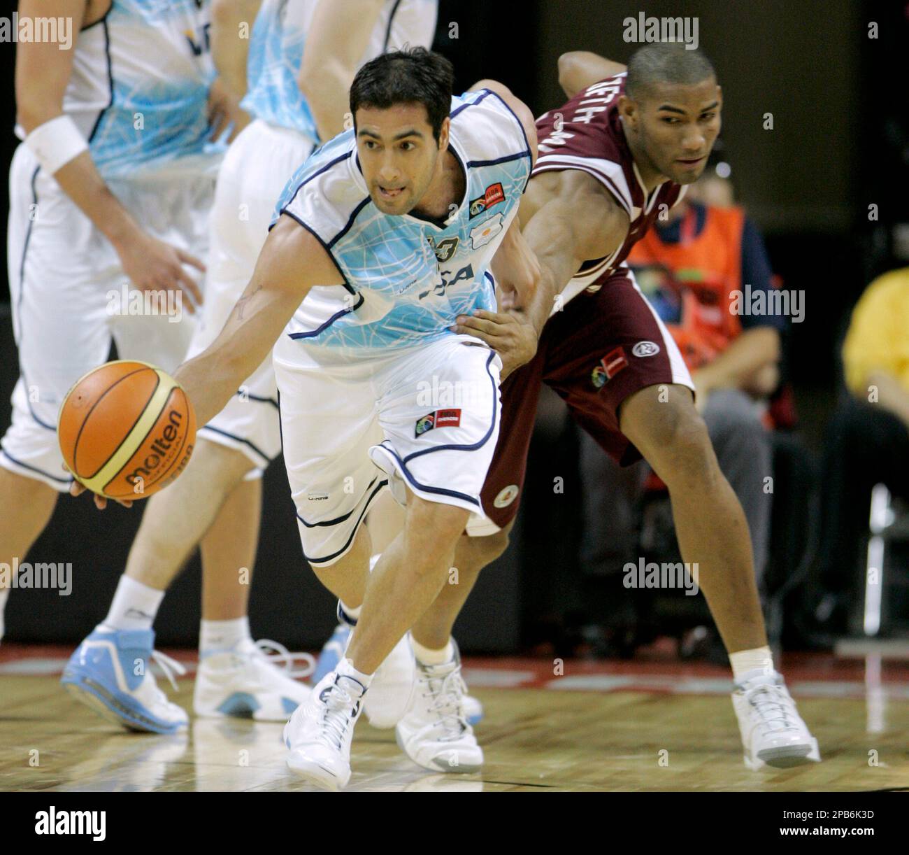 Argentina's Paolo Quinteros steals a ball from Venezuela's Luis ...