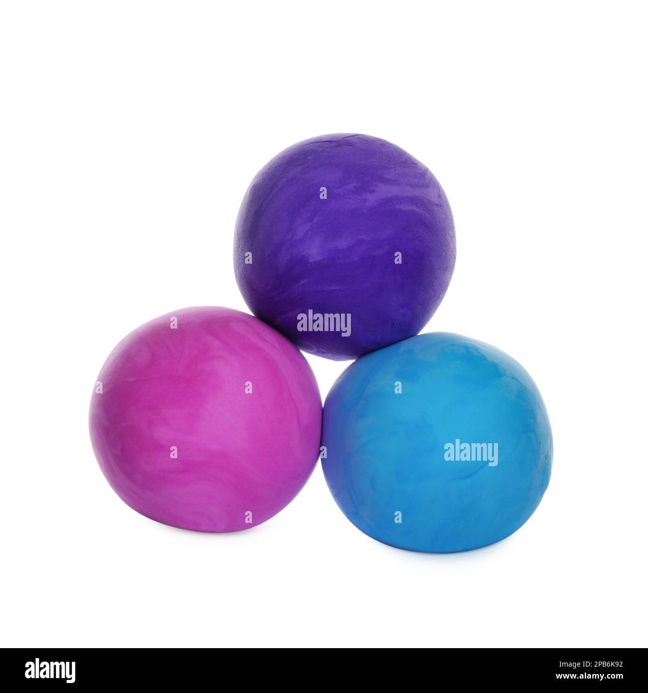 Different color play dough balls isolated on white Stock Photo - Alamy