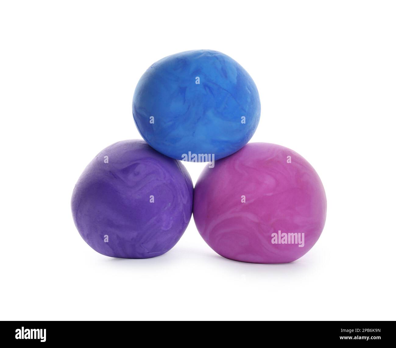 Different color play dough balls isolated on white Stock Photo - Alamy