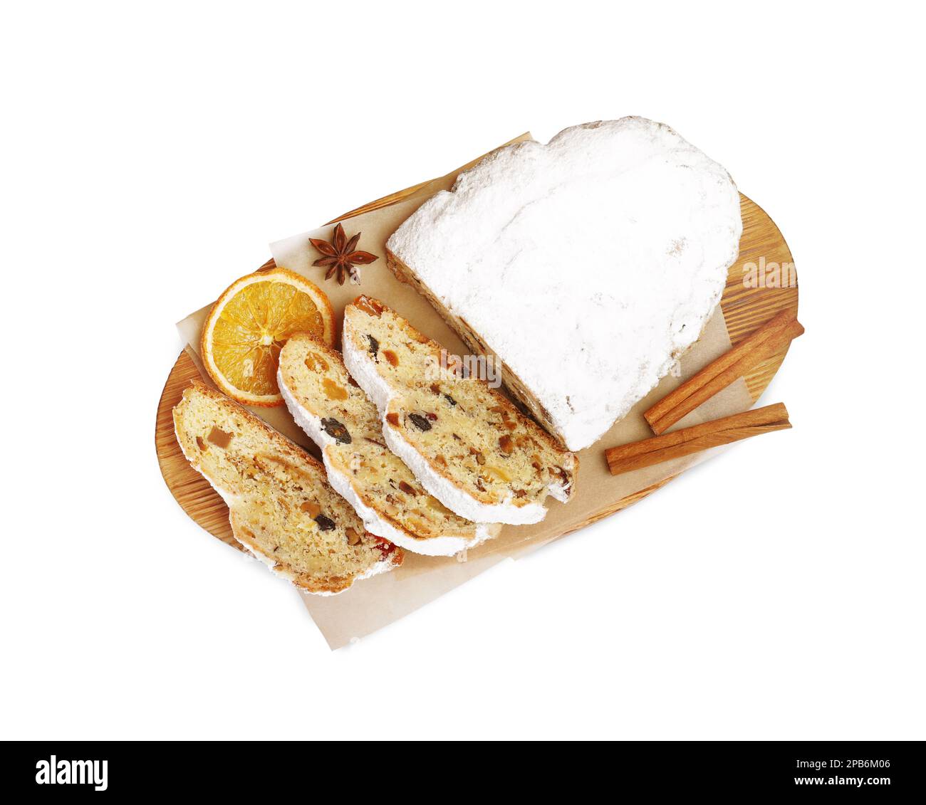 Traditional Christmas Stollen with icing sugar on white background, top ...