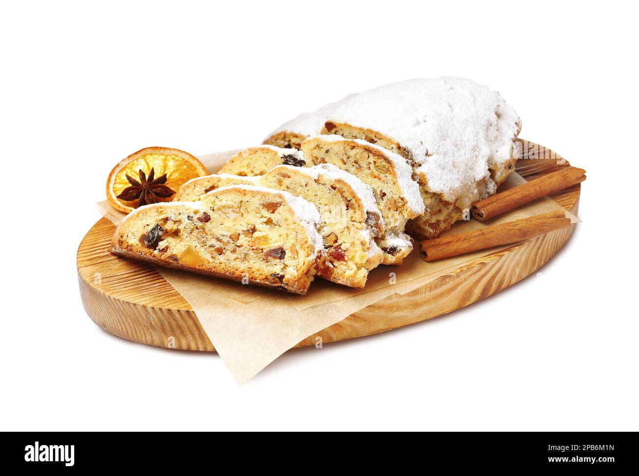 Traditional Christmas Stollen with icing sugar on white background ...