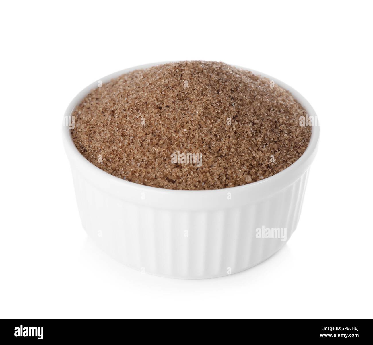 Brown salt in bowl isolated on white Stock Photo - Alamy