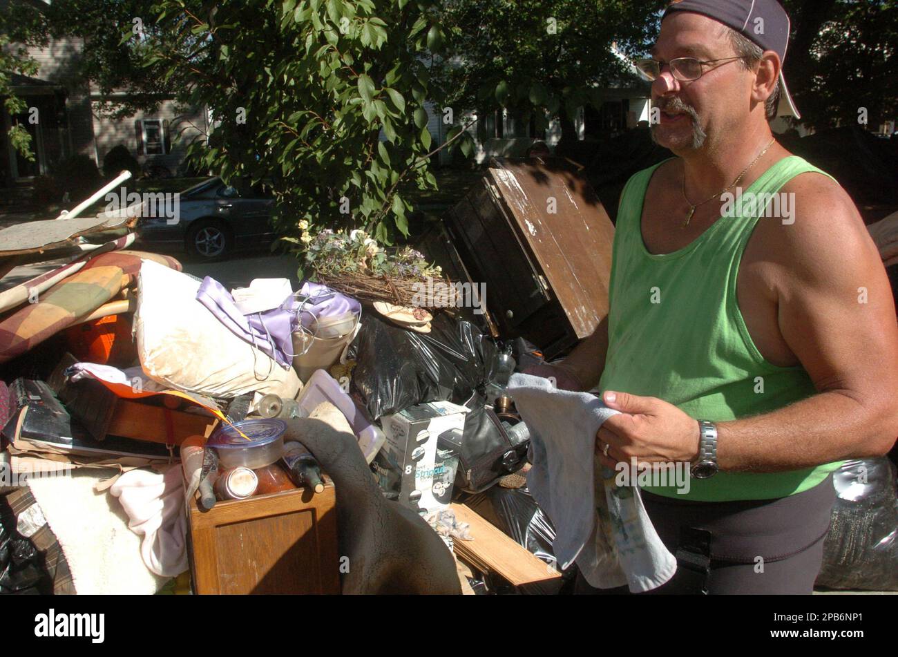 Tim Tagliapietra stands in front of his belongings after they were ...