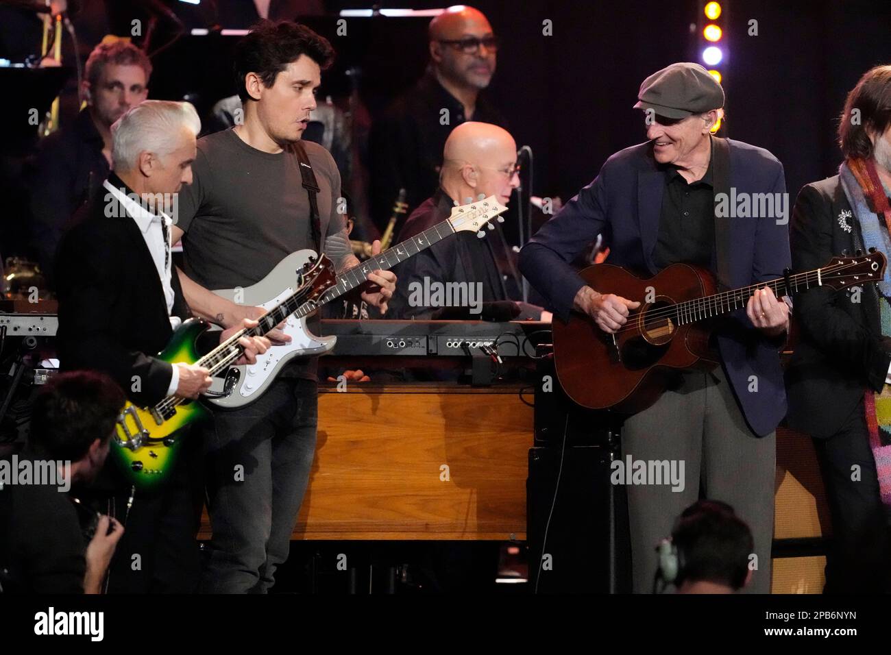 Neil Giraldo, from left, John Mayer and James Taylor perform at the 7th ... Neil Giraldo, from left, John Mayer and James Taylor perform at the 7th ...