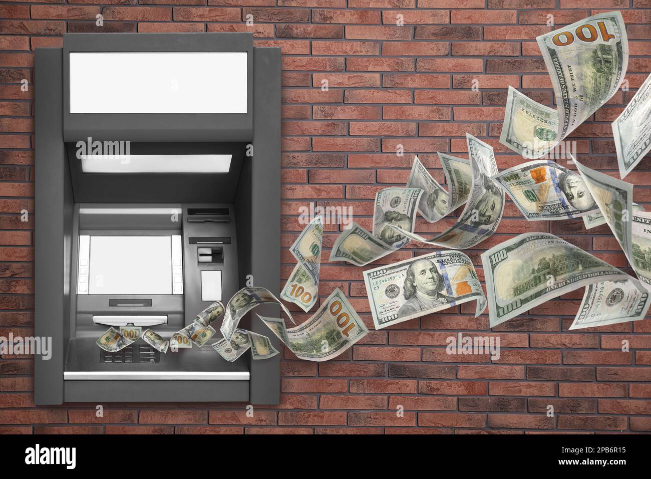 Modern automated cash machine on brick wall and flying money Stock Photo - Alamy