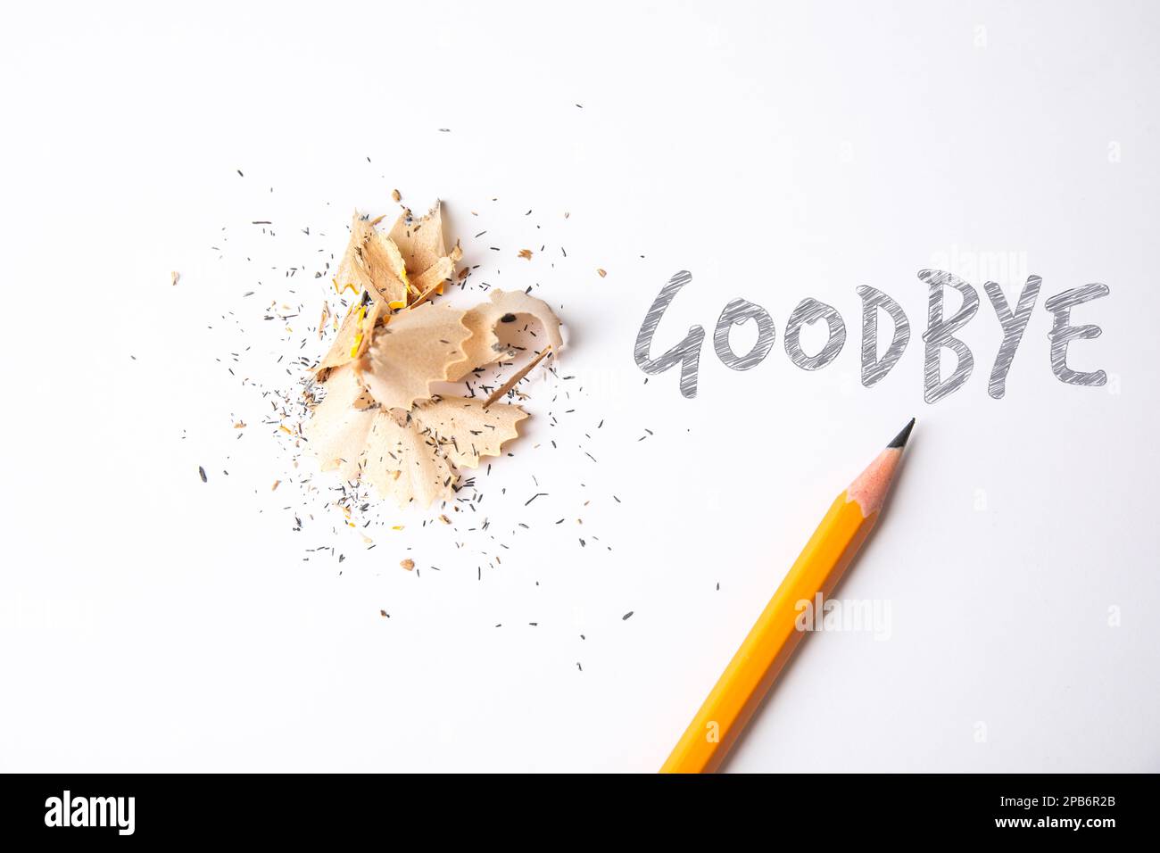 Pencil, shavings and word Goodbye on white background, top view Stock ...