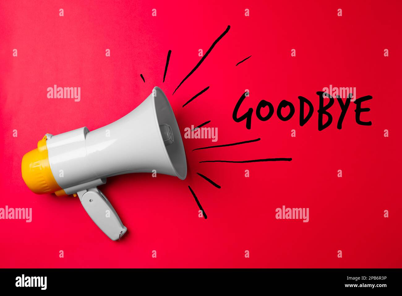 Electronic loudspeaker and word Goodbye on red background, top view ...