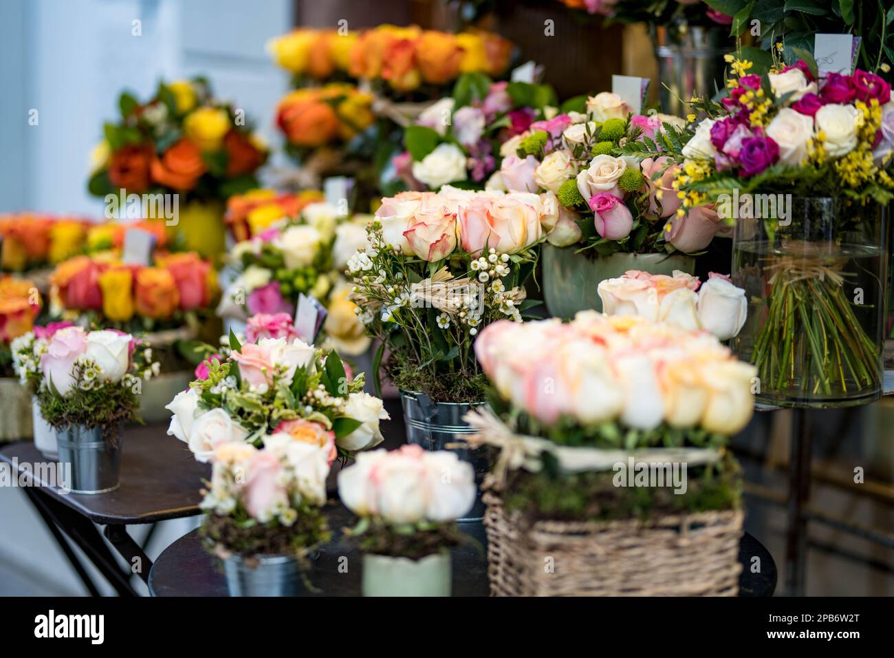 Beautiful colorful rose bouquets sold on outdoor flower shop in Milan ...