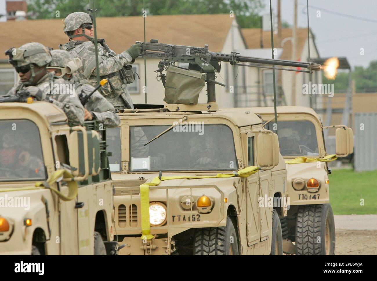 A member of Team Mojo clears his weapon at Fort Riley, Kan., Thursday ...