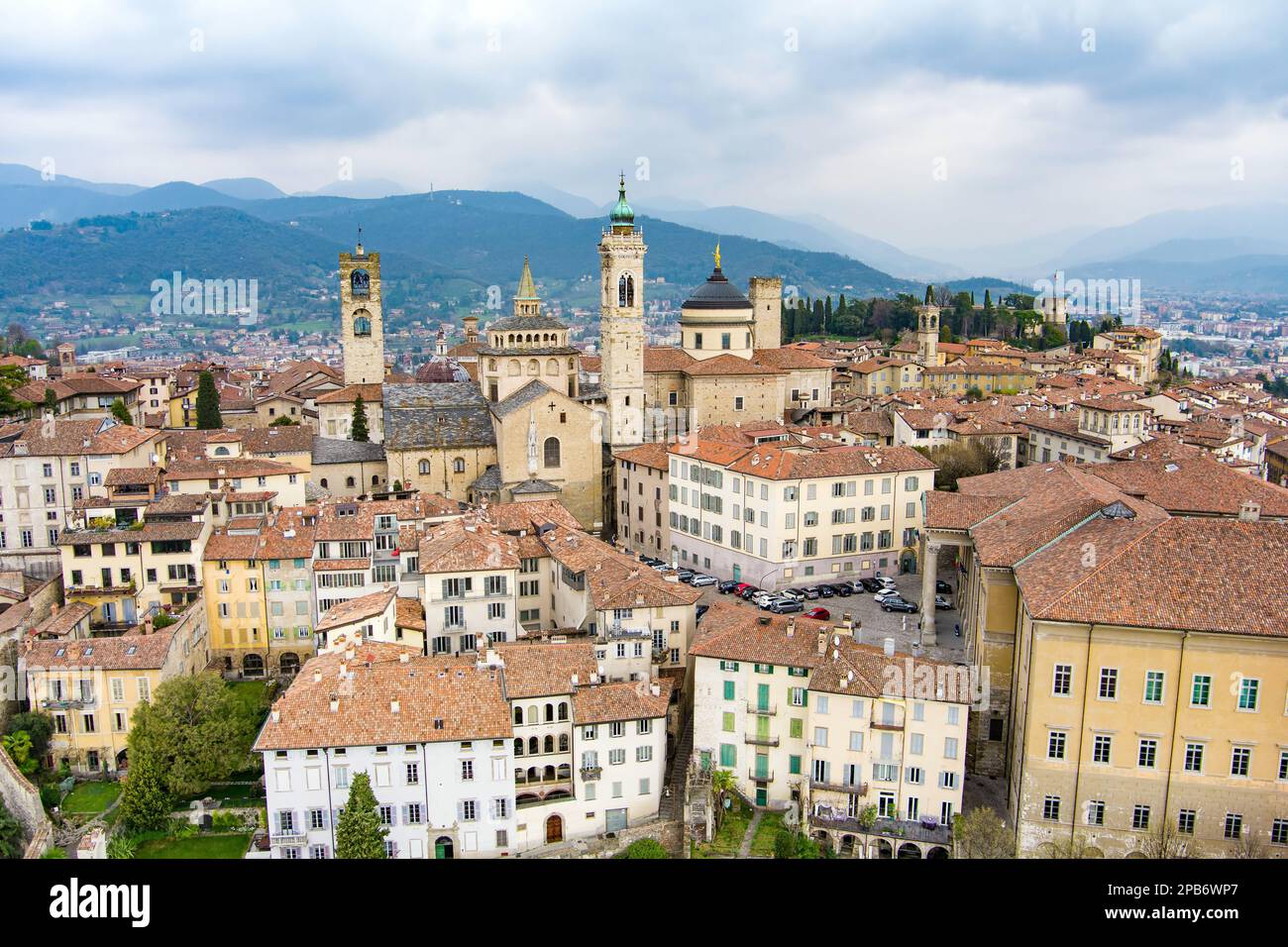 Scenic aerial view of Bergamo city northeast of Milan. Flying over ...