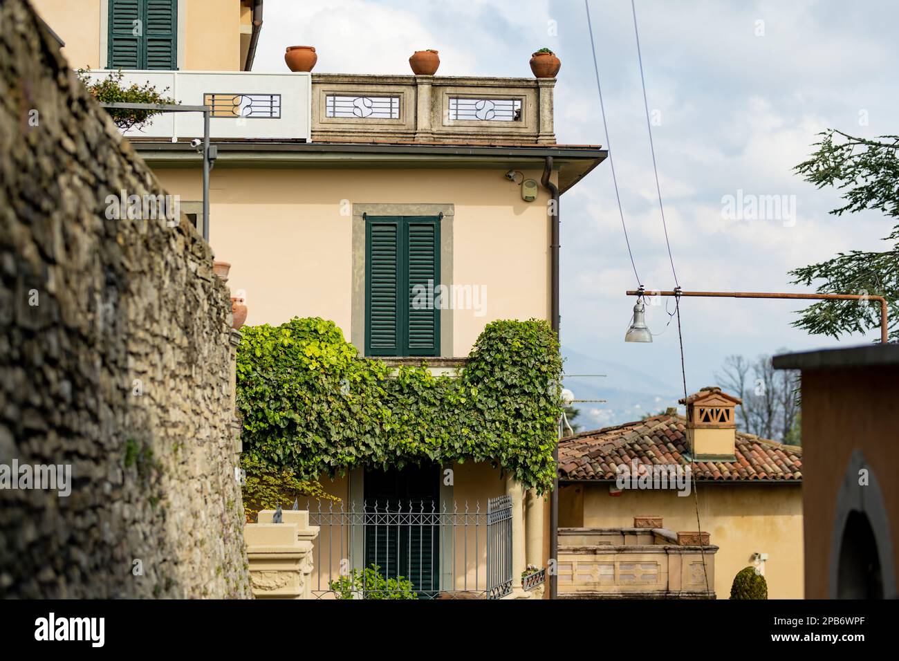 Narrow medieval streets of Bergamo city northeast of Milan. Scenic ...