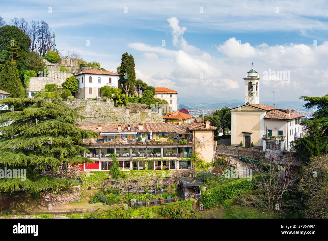 Scenic aerial view of Bergamo city northeast of Milan. Flying over ...