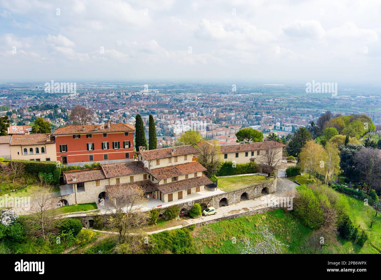 Scenic aerial view of Bergamo city northeast of Milan. Flying over ...
