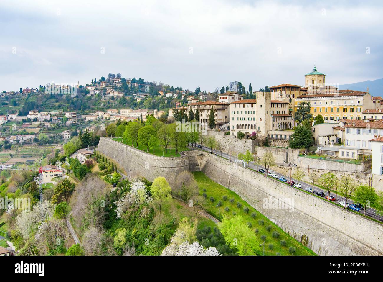 Scenic aerial view of Bergamo city northeast of Milan. Flying over ...