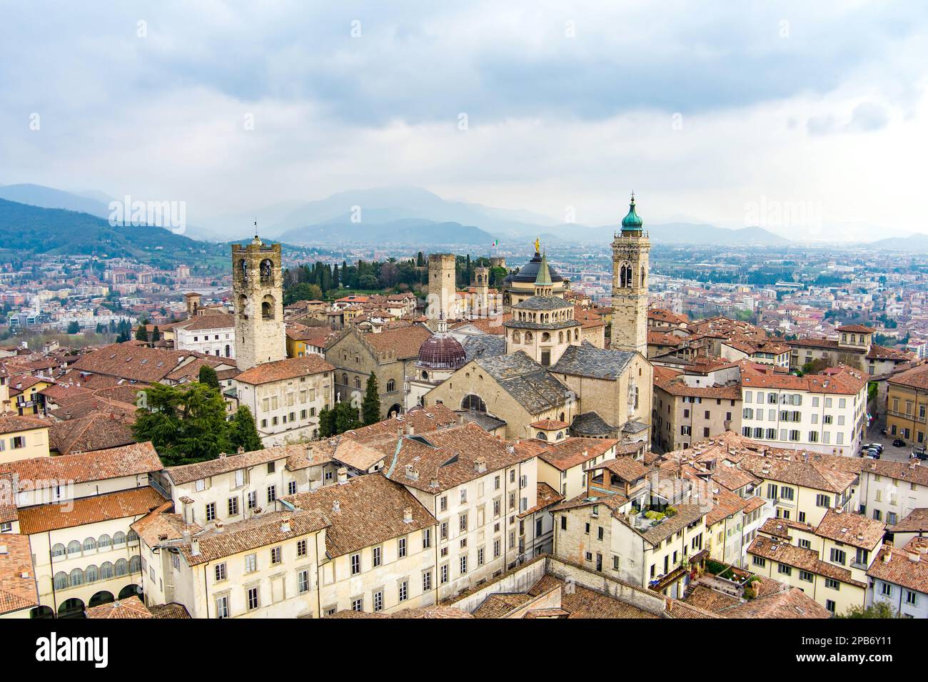 Scenic aerial view of Bergamo city northeast of Milan. Flying over ...