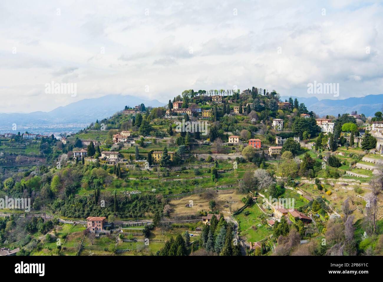 Scenic aerial view of Bergamo city northeast of Milan. Flying over ...