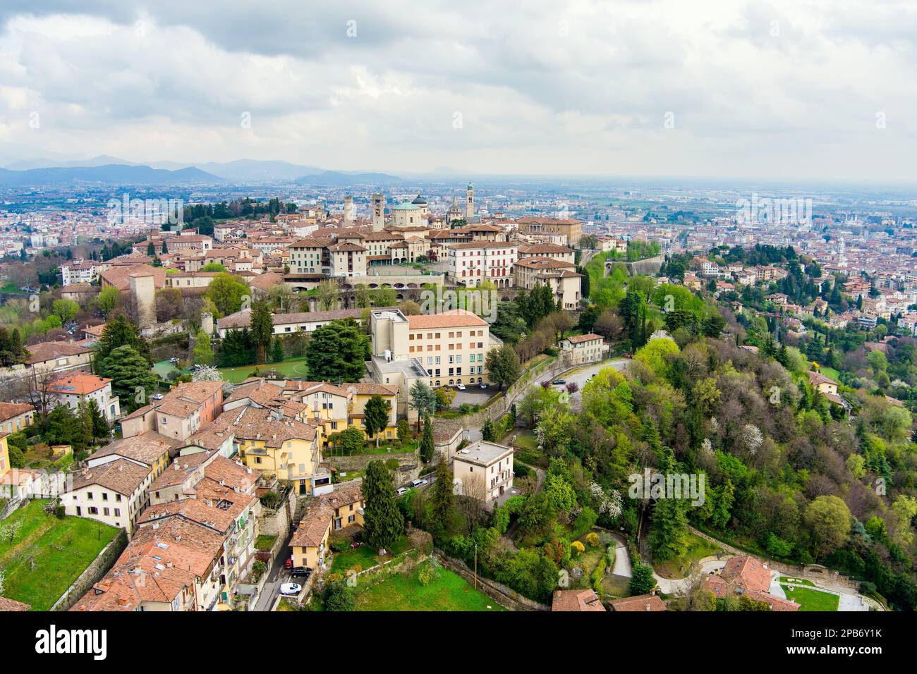 Scenic aerial view of Bergamo city northeast of Milan. Flying over ...
