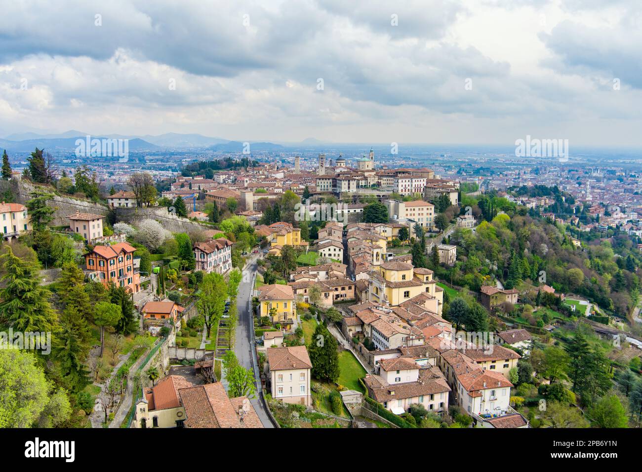 Scenic aerial view of Bergamo city northeast of Milan. Flying over ...