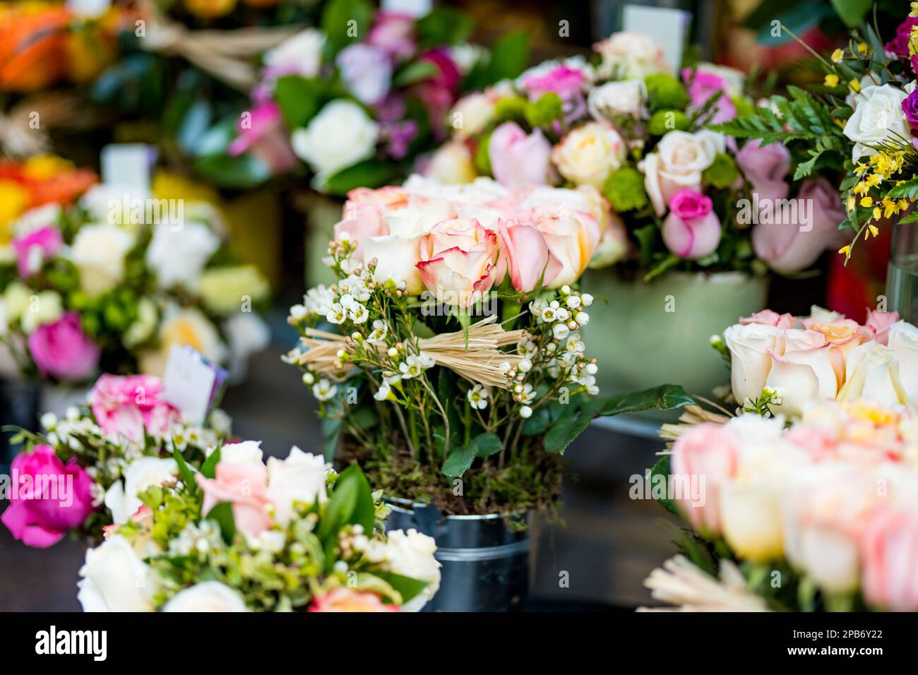 Beautiful colorful rose bouquets sold on outdoor flower shop in Milan ...
