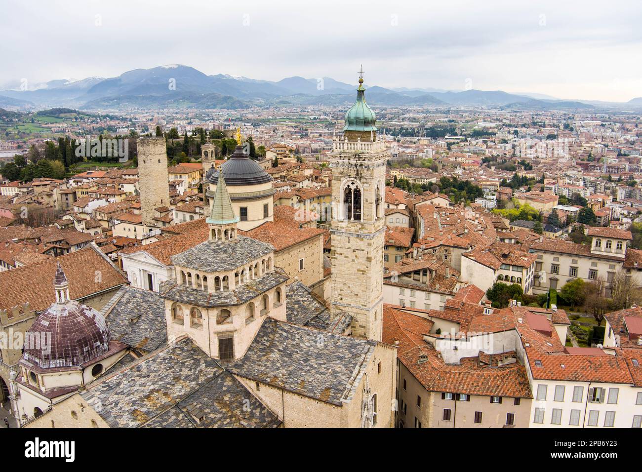Scenic aerial view of Bergamo city northeast of Milan. Flying over ...