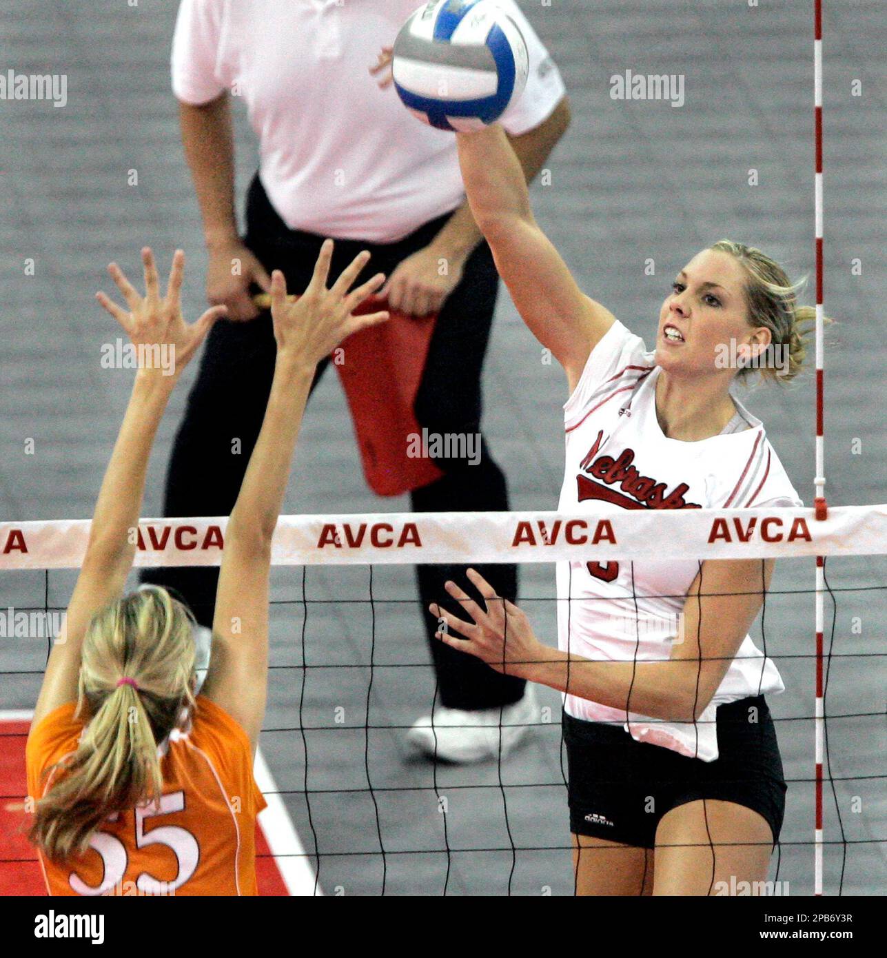 Nebraska's Christina Houghtelling (3) scores a kill against Tennessee's ...