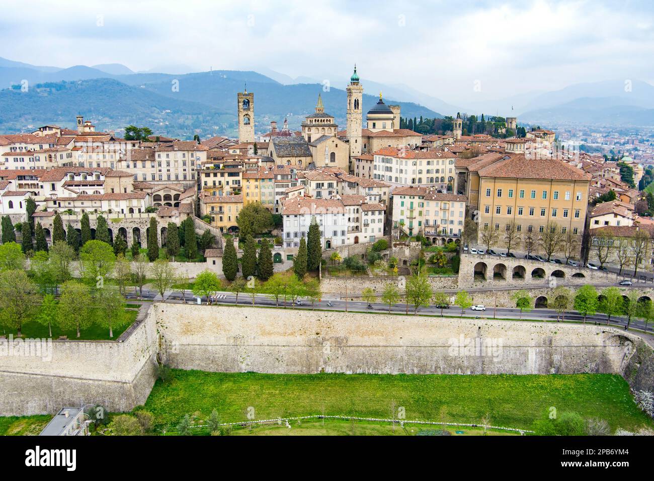 Scenic aerial view of Bergamo city northeast of Milan. Flying over ...