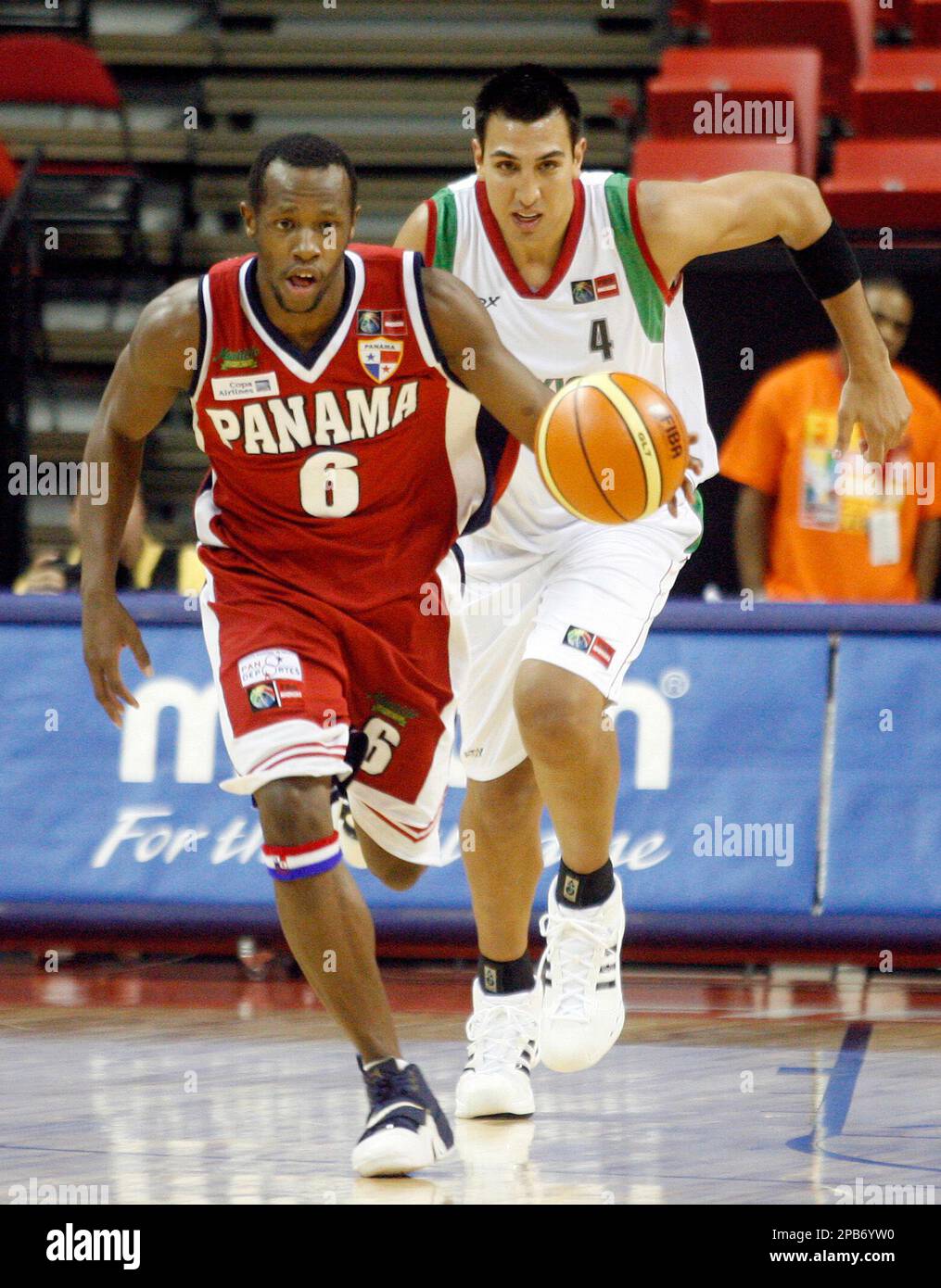 Panama's Danilo Pinnock drives down the court followed by Mexico's Adam ...