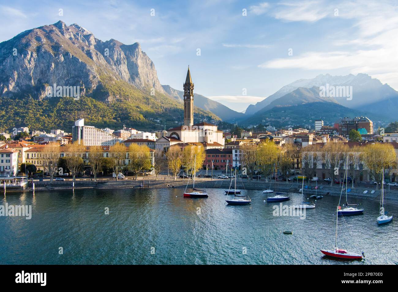 Sunny aerial cityscape of Lecco town on spring morning. Picturesque ...